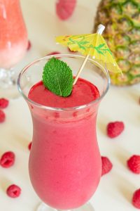 Smooth Raspberry Pina Colada Recipe » A Couple of Sips